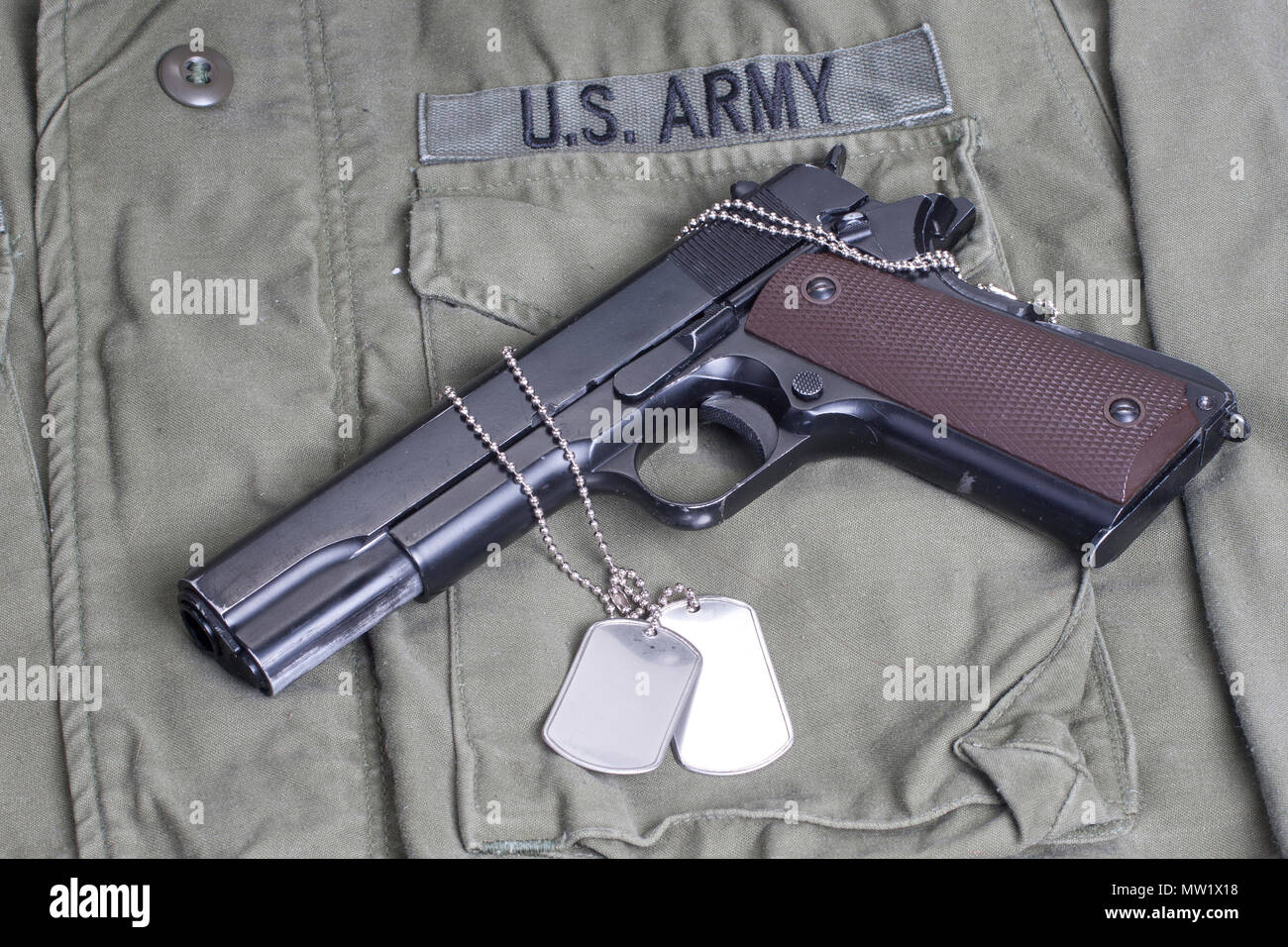 colt government M1911 on US ARMY uniform Stock Photo - Alamy
