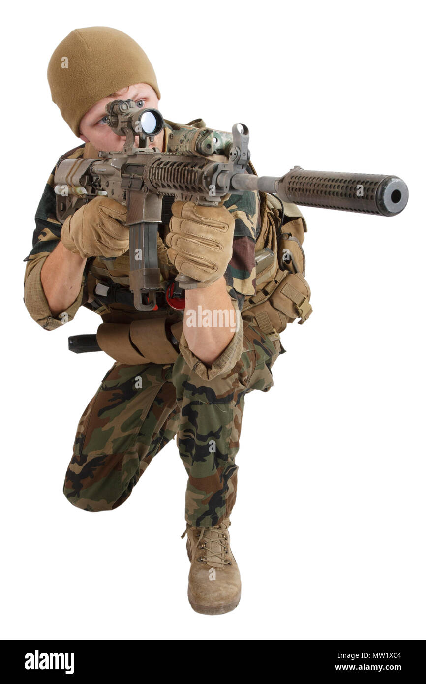 Private Military Company operator with assault rifle on white ...