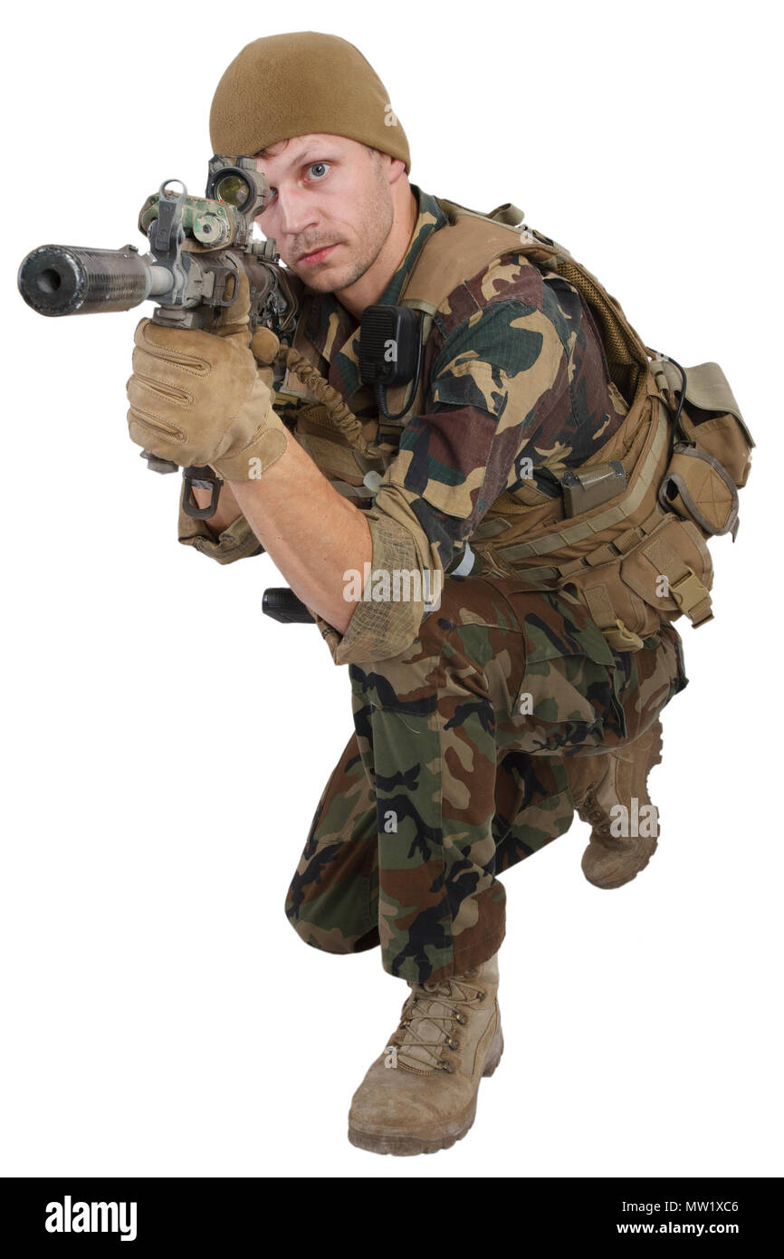 Private Military Company operator with assault rifle on white ...