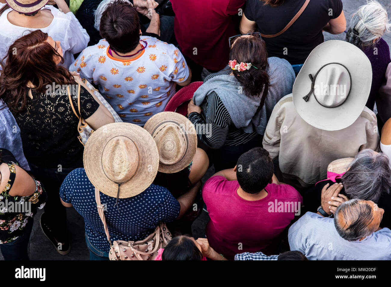 A crowd gathers to watch the Good Friday Procession, known as the Santo ...