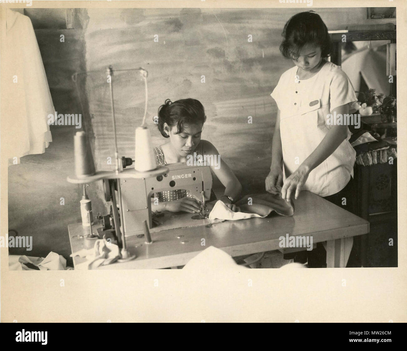 Philippines - Miscellaneous - Women working on sewing machine Stock ...