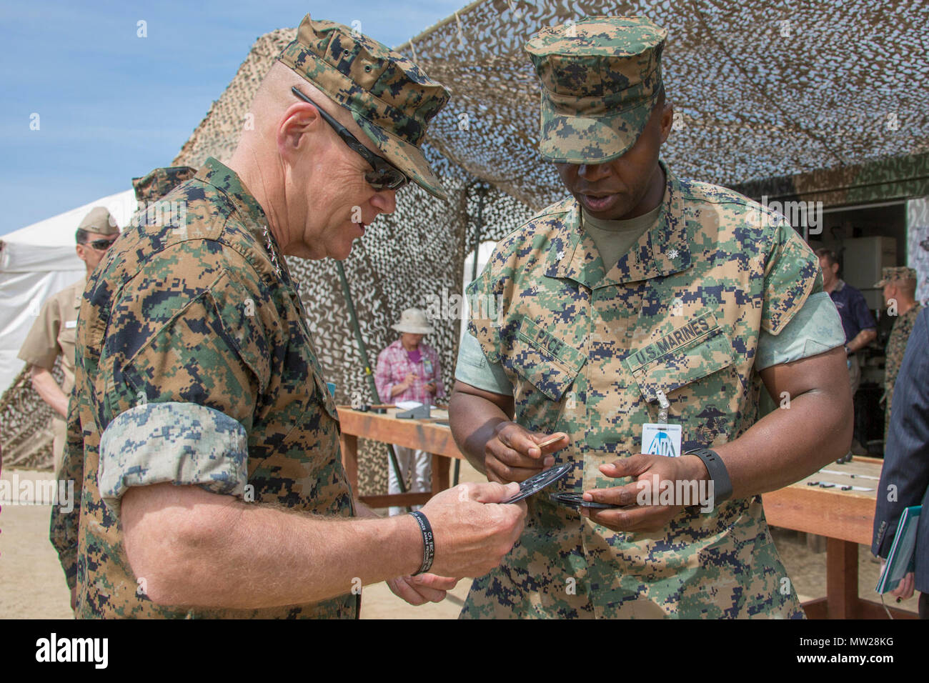 Commandant of the Marine Corps Gen. Robert B. Neller, right, speaks ...