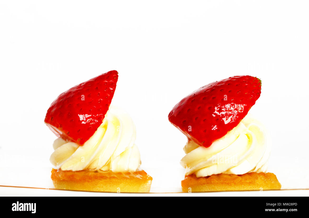 Beautiful small fruit dessert cake on white background Stock Photo - Alamy