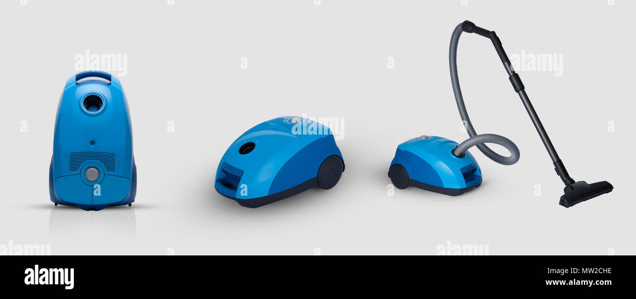 full view of a modern household vacuum cleaner of blue color on a white ...
