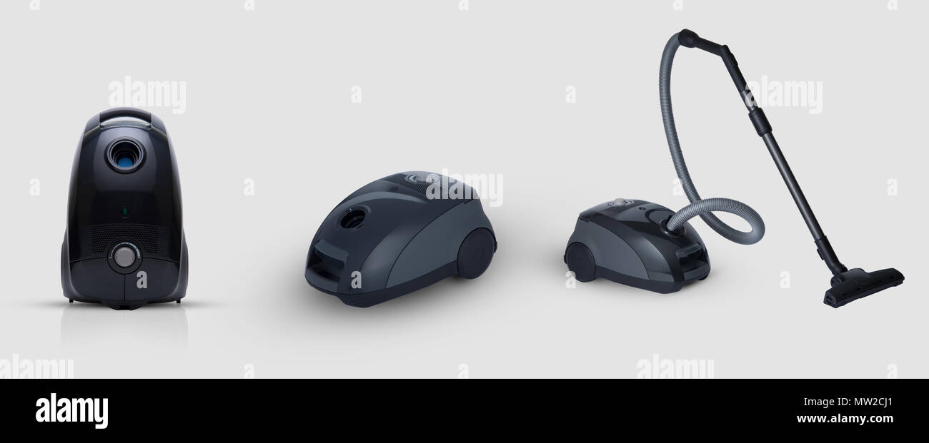full view of a modern household vacuum cleaner of grey color on a white ...