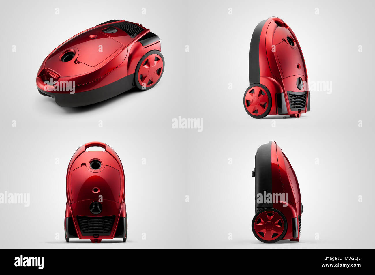full view of a modern household vacuum cleaner of red color on a white ...