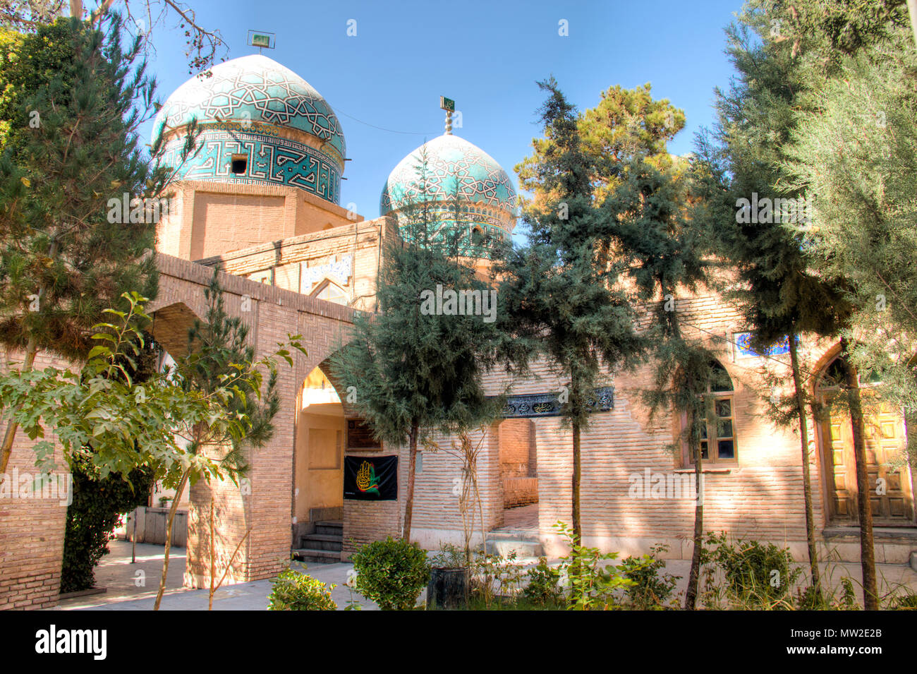The three dome mosque or Moshtaqieh mosque in the centre of Kerman in ...