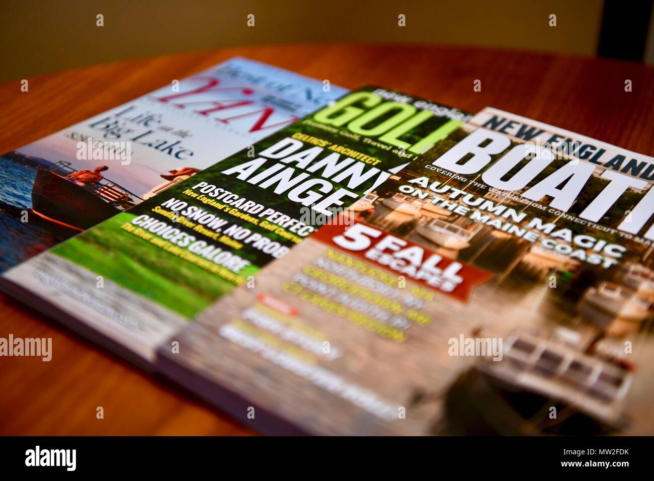 Magazines on a hotel nightstand Stock Photo - Alamy