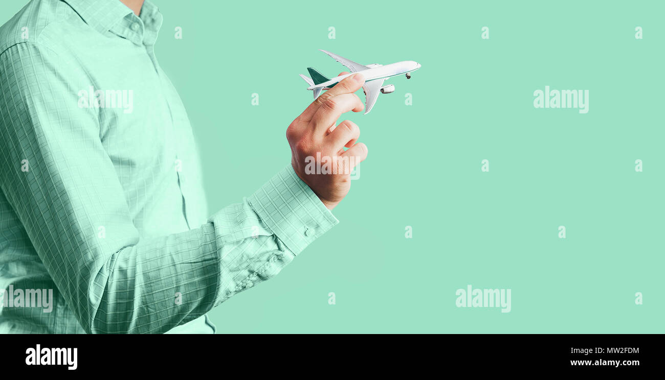 View on man which holding plane in hand. Fly, flight concept. Isolated ...