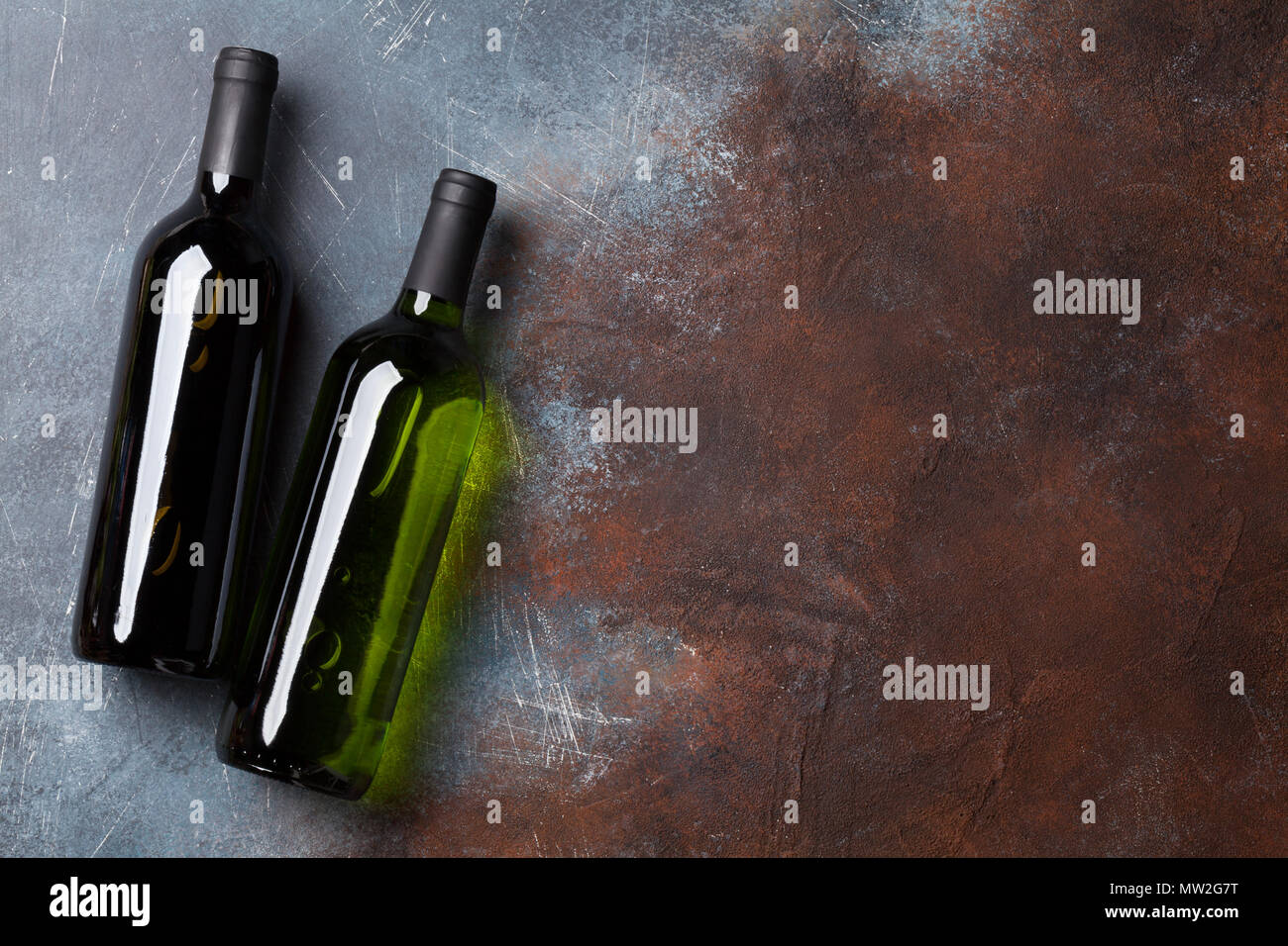 Red and white wine bottles. Top view with space for your text Stock ...