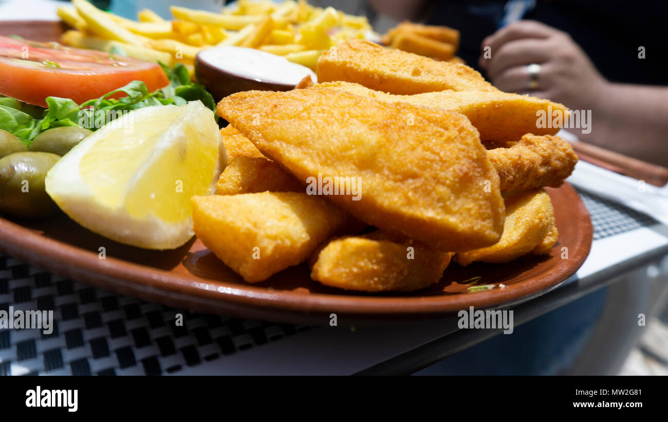 plate of fried cuttlefish typical of the city of Setubal in portugal ...