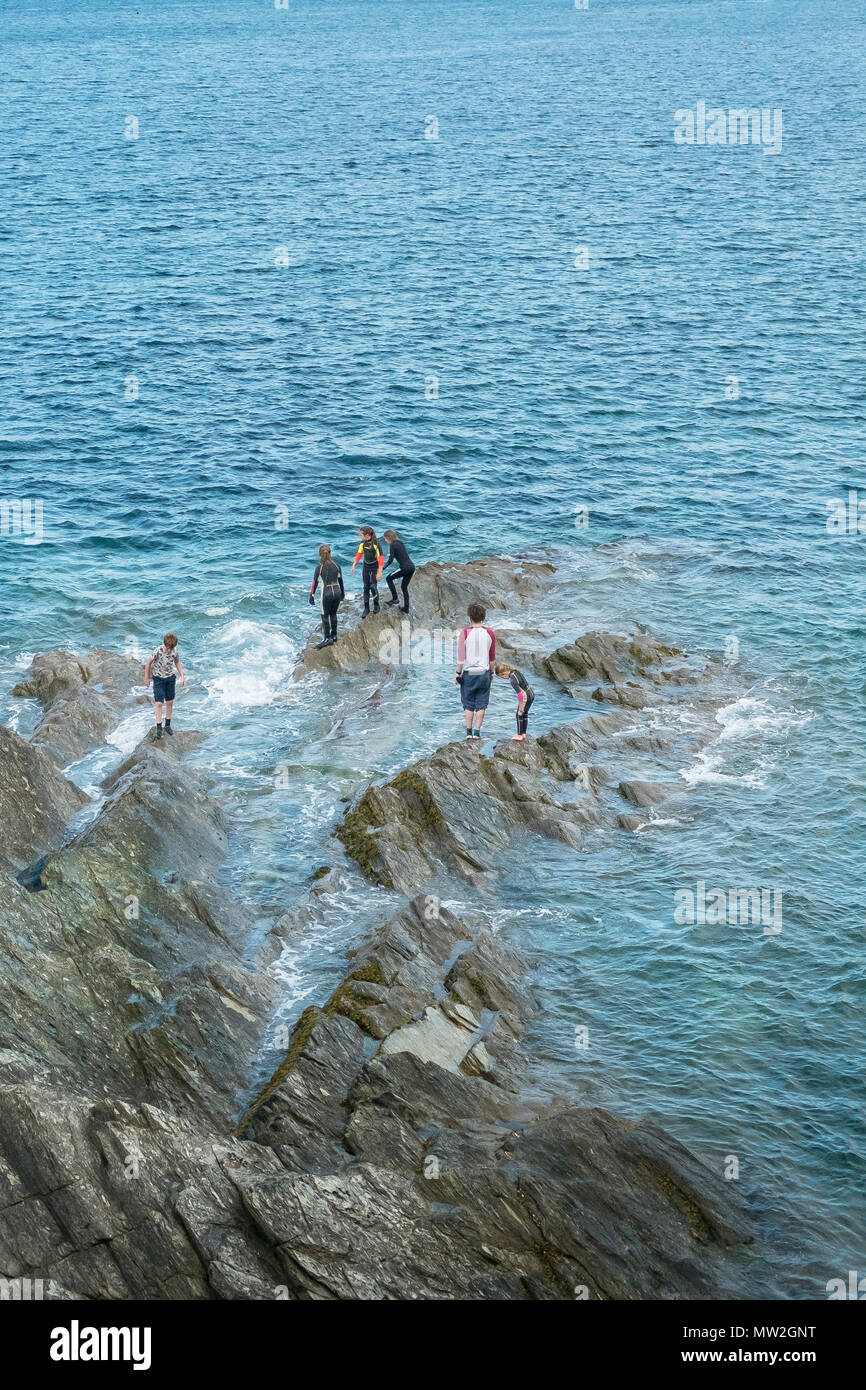 Children on rocks hi-res stock photography and images - Alamy
