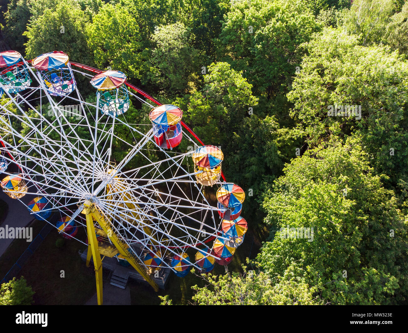 ferris wheel in amusement park at summer morning. aerial photography ...
