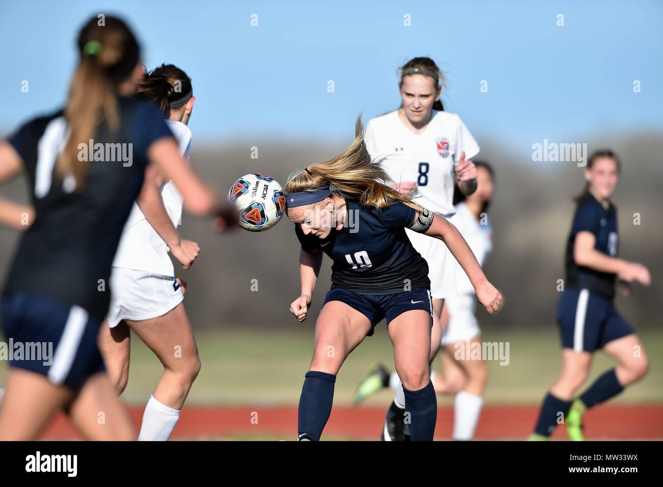 Women football soccer players header hi-res stock photography and ...