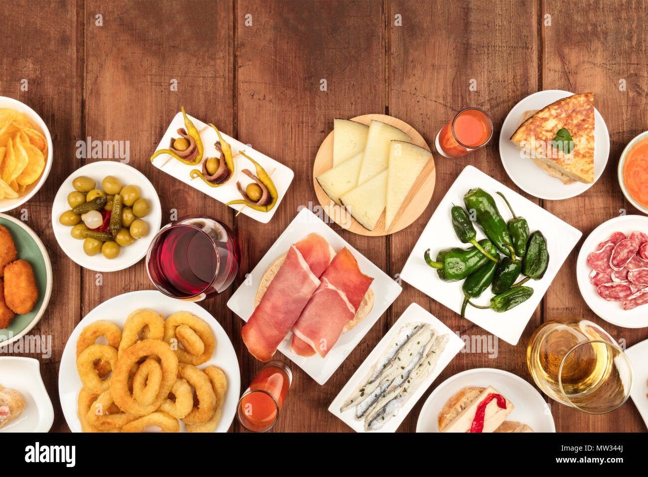 An overhead photo of an assortment of Spanish tapas food, shot from the ...