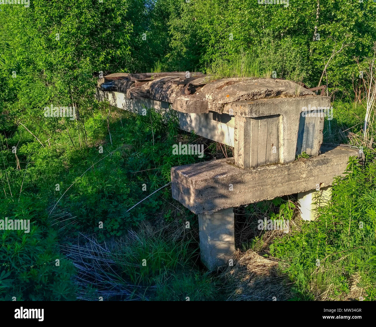 old unfinished destroyed narrow-gauge railway on concrete blocks ...