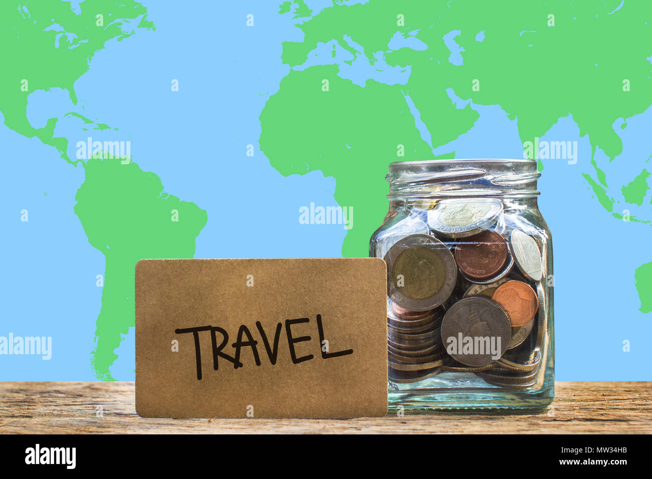 Conceptual saving money for travel with world map as background Stock ...