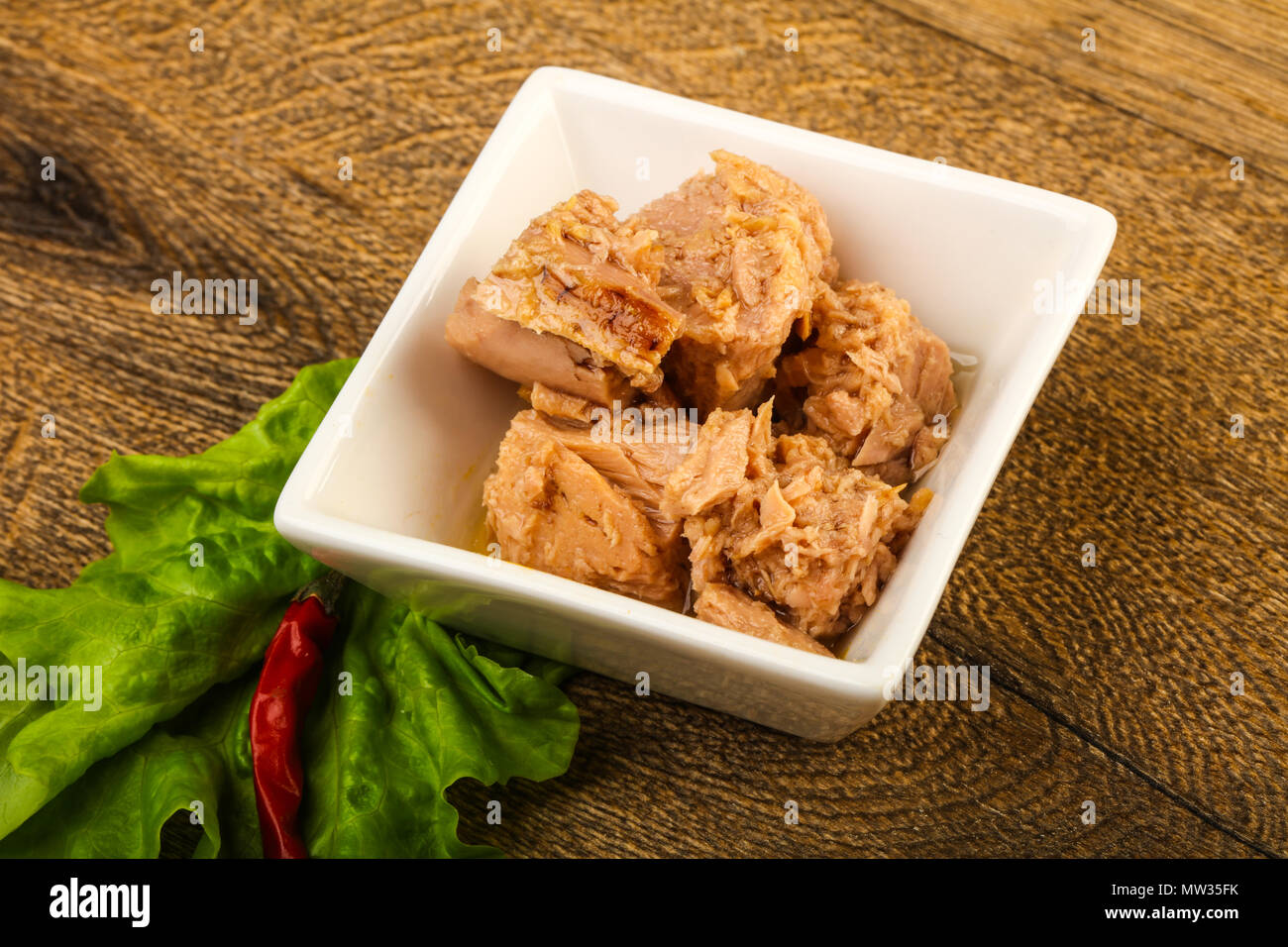 Canned tuna fish in the bowl ready for cooking Stock Photo - Alamy
