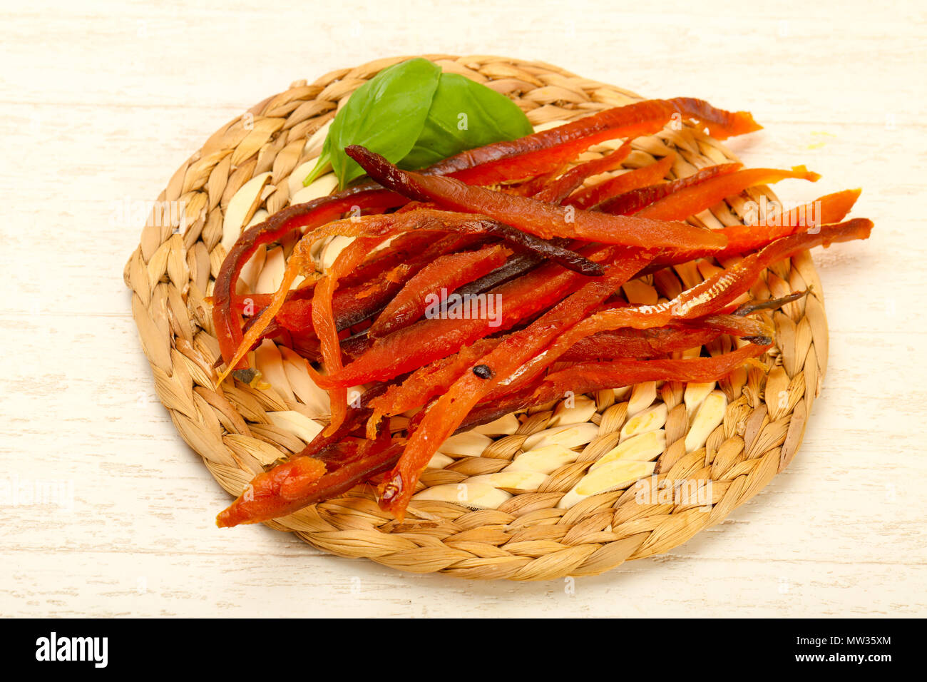 Salmon dry sticks snack Stock Photo - Alamy