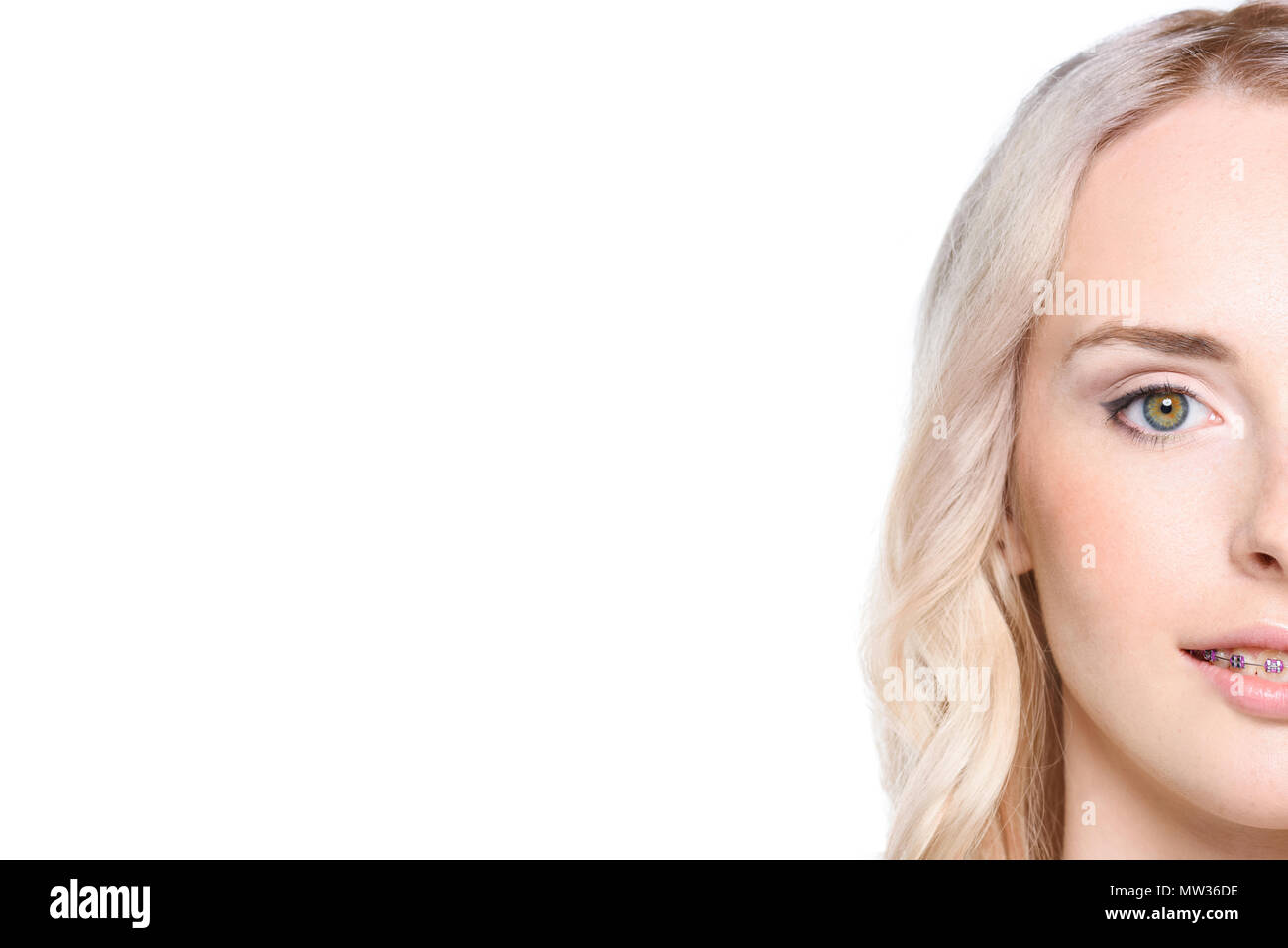 Half shot of a young woman face isolated on white Stock Photo - Alamy