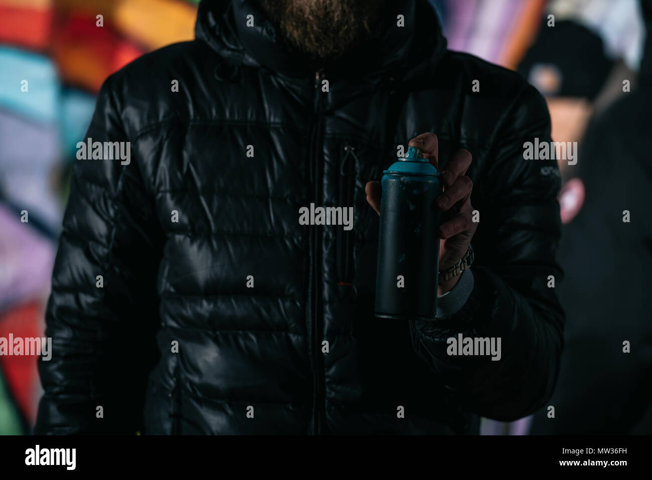 Man holding can spray paint hi-res stock photography and images - Alamy