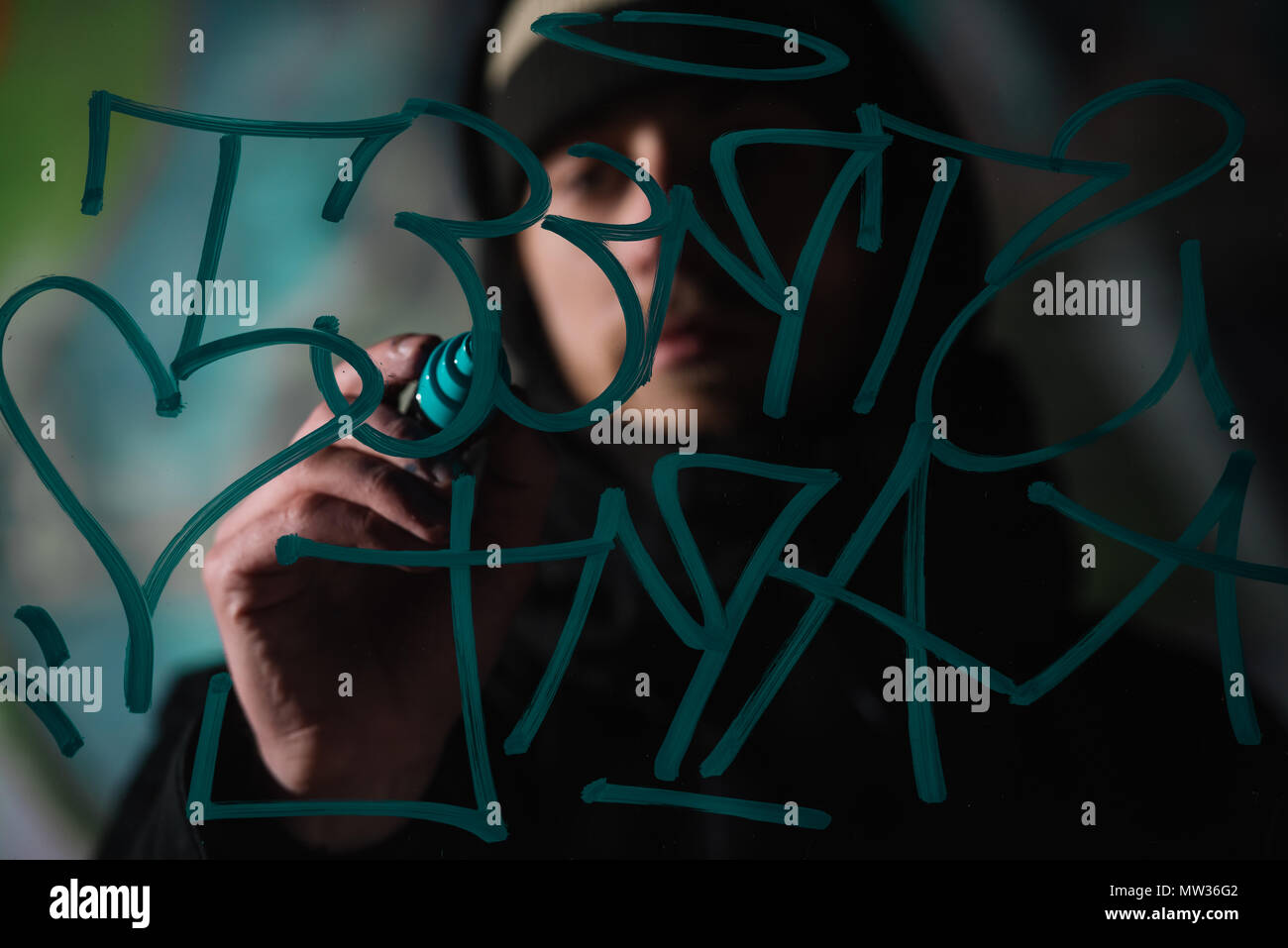 Person graffiti writing street art hi-res stock photography and images ...