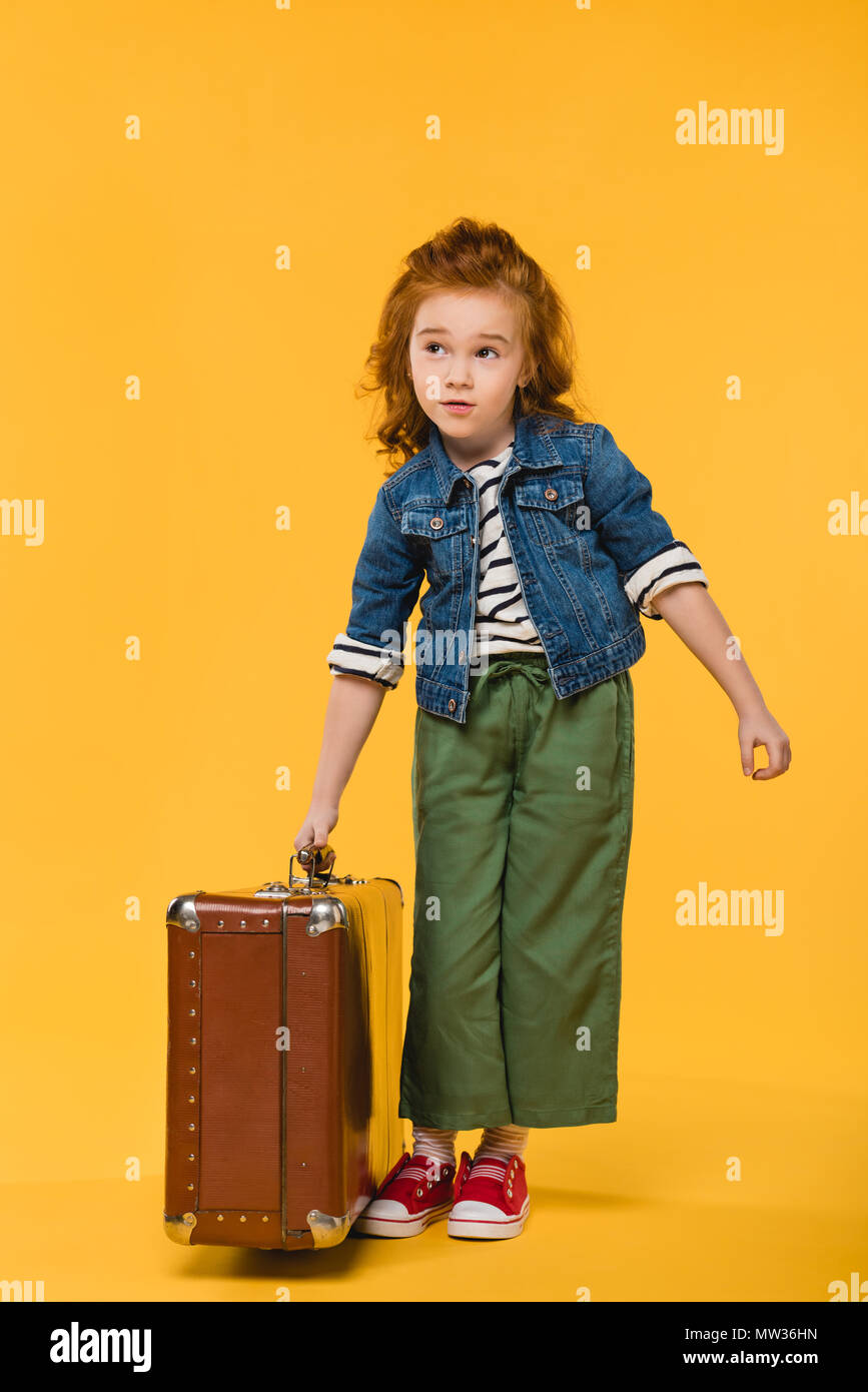 Child with suitcase hi-res stock photography and images - Alamy