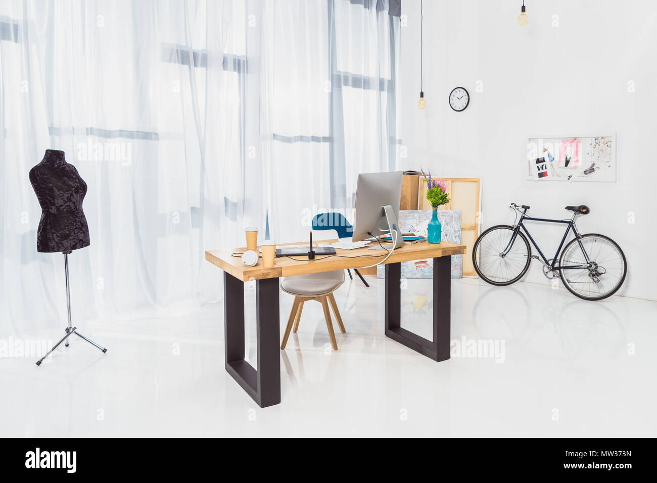 Room interior with working table and bicycle by the wall Stock Photo ...