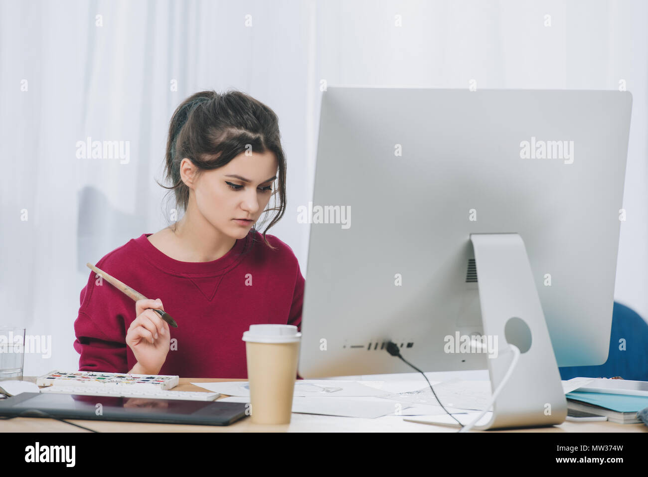 Female artist working with illustrations by computer Stock Photo - Alamy