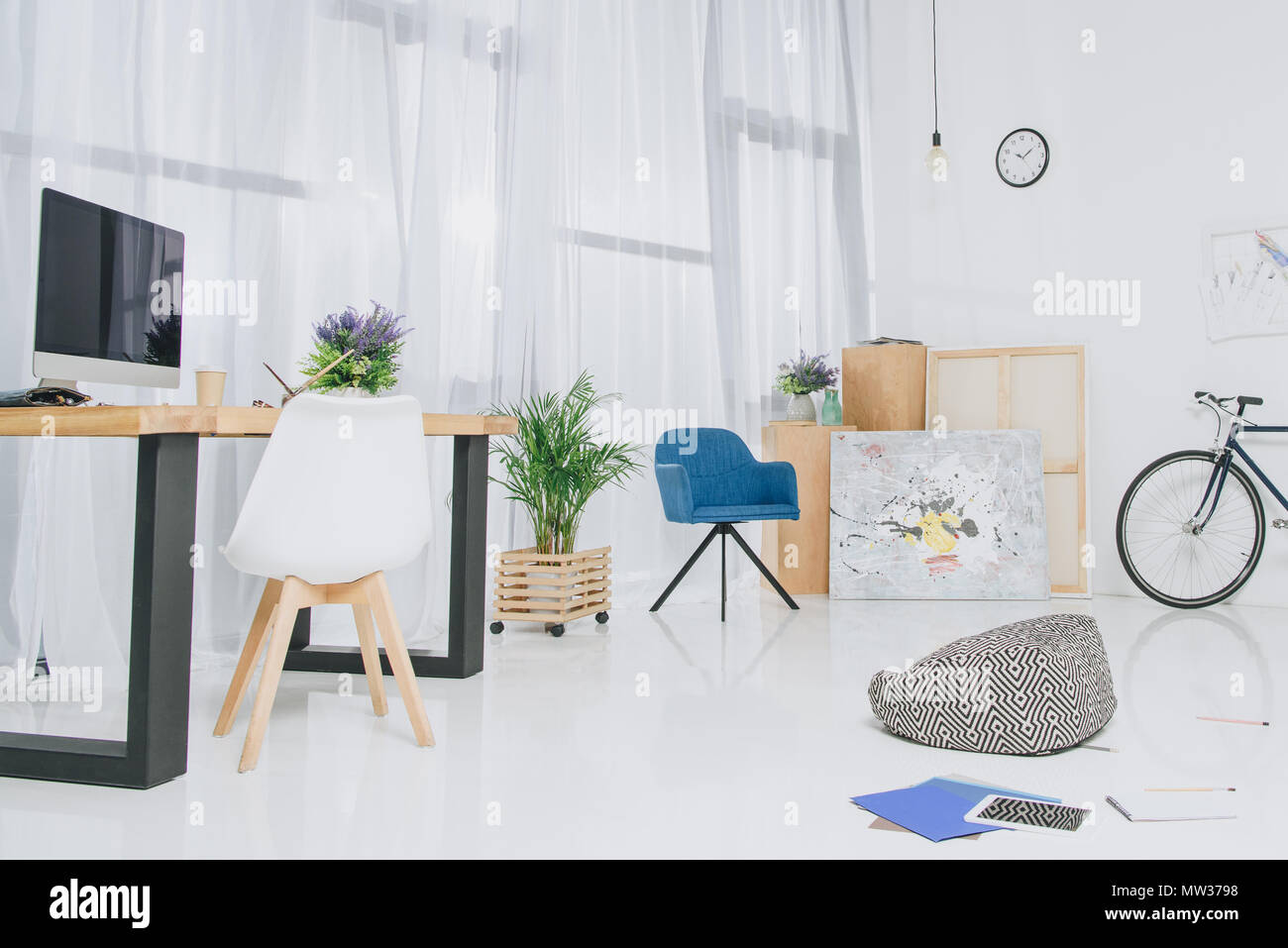 Room interior with working table and bicycle by the wall Stock Photo ...