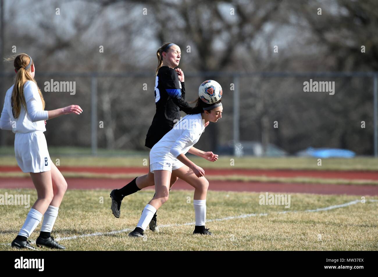 Women football soccer players header hi-res stock photography and ...