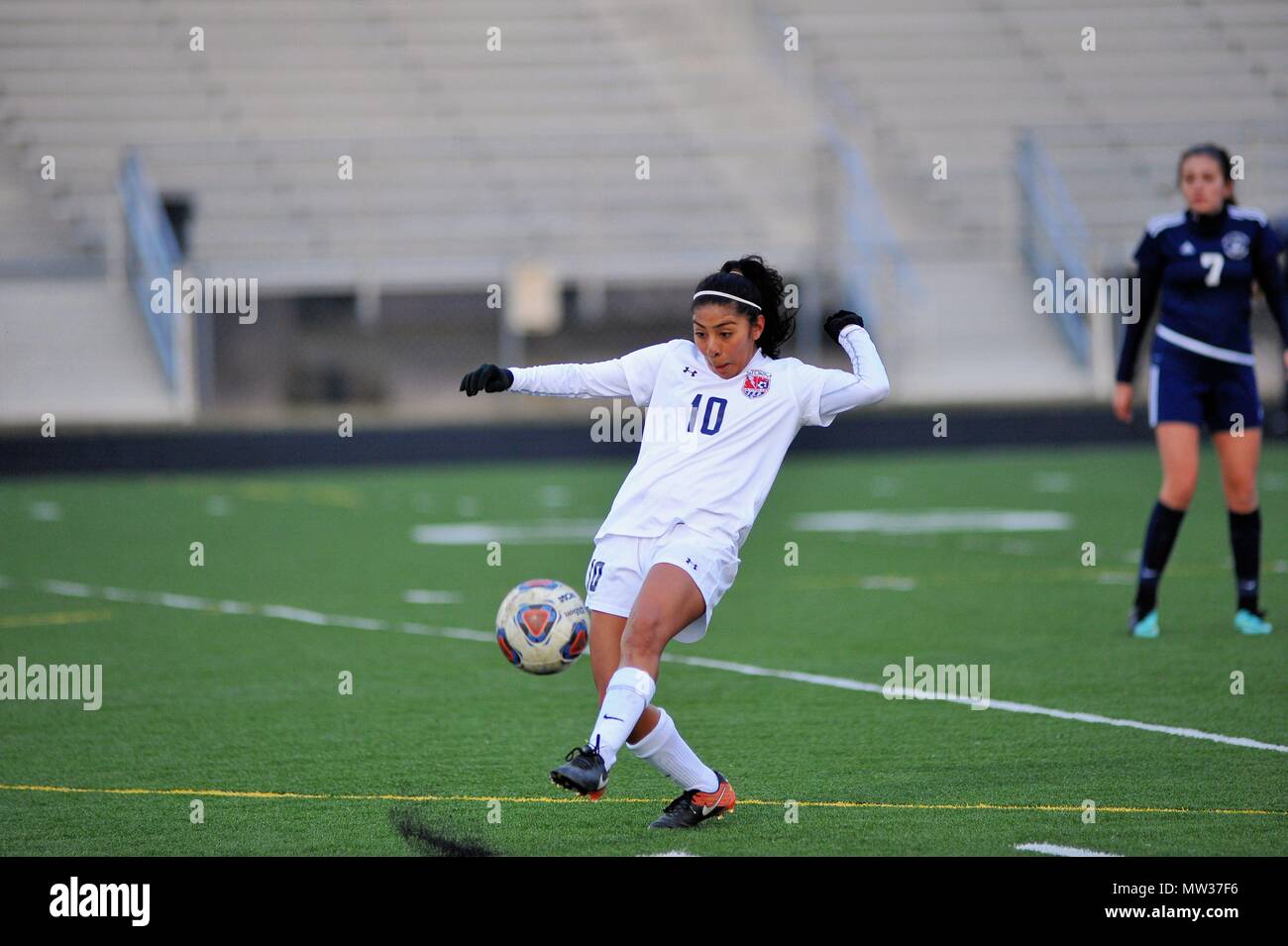 In open space, the defender battled to control a loose ball deep in her ...