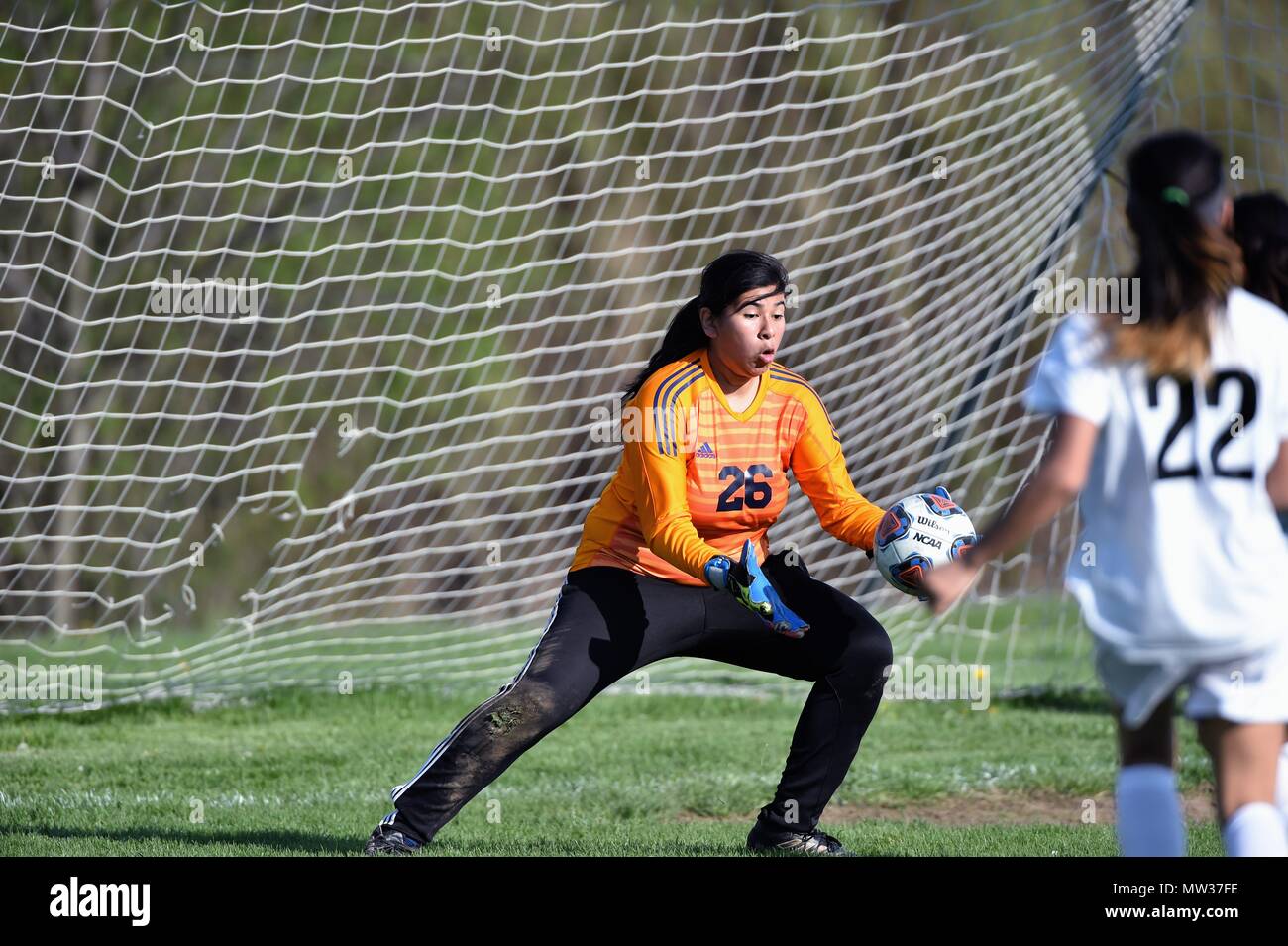 Female football goal keeper save ball hi-res stock photography and ...