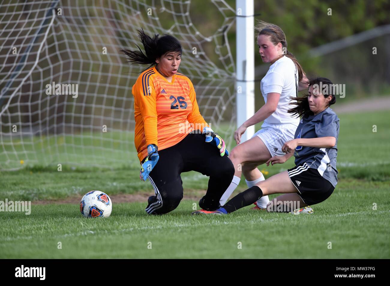 Female football goal keeper save ball hi-res stock photography and ...