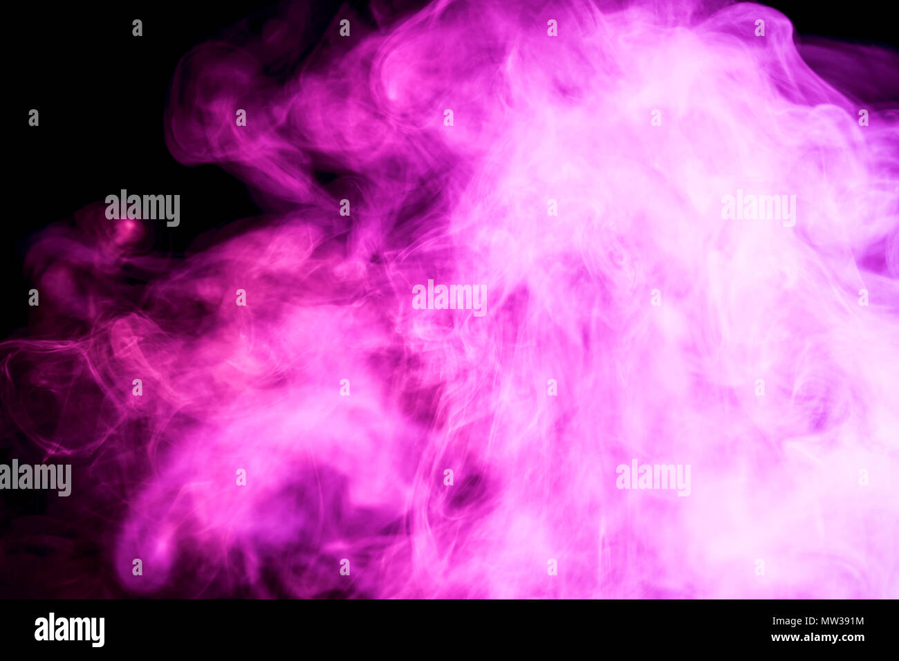 Thick colorful pink smoke on a black isolated background. Background ...