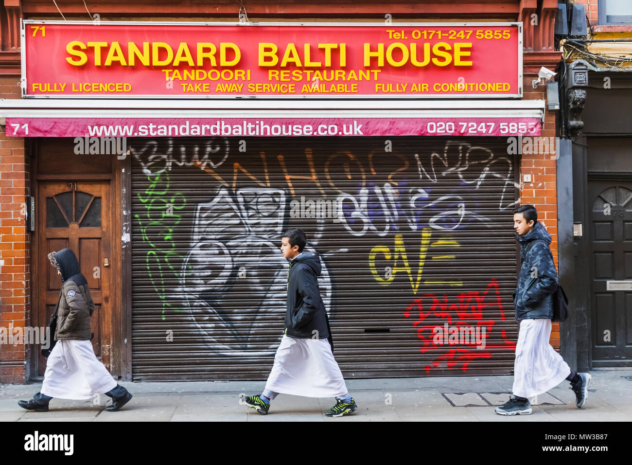 Muslim boy walking hi-res stock photography and images - Alamy
