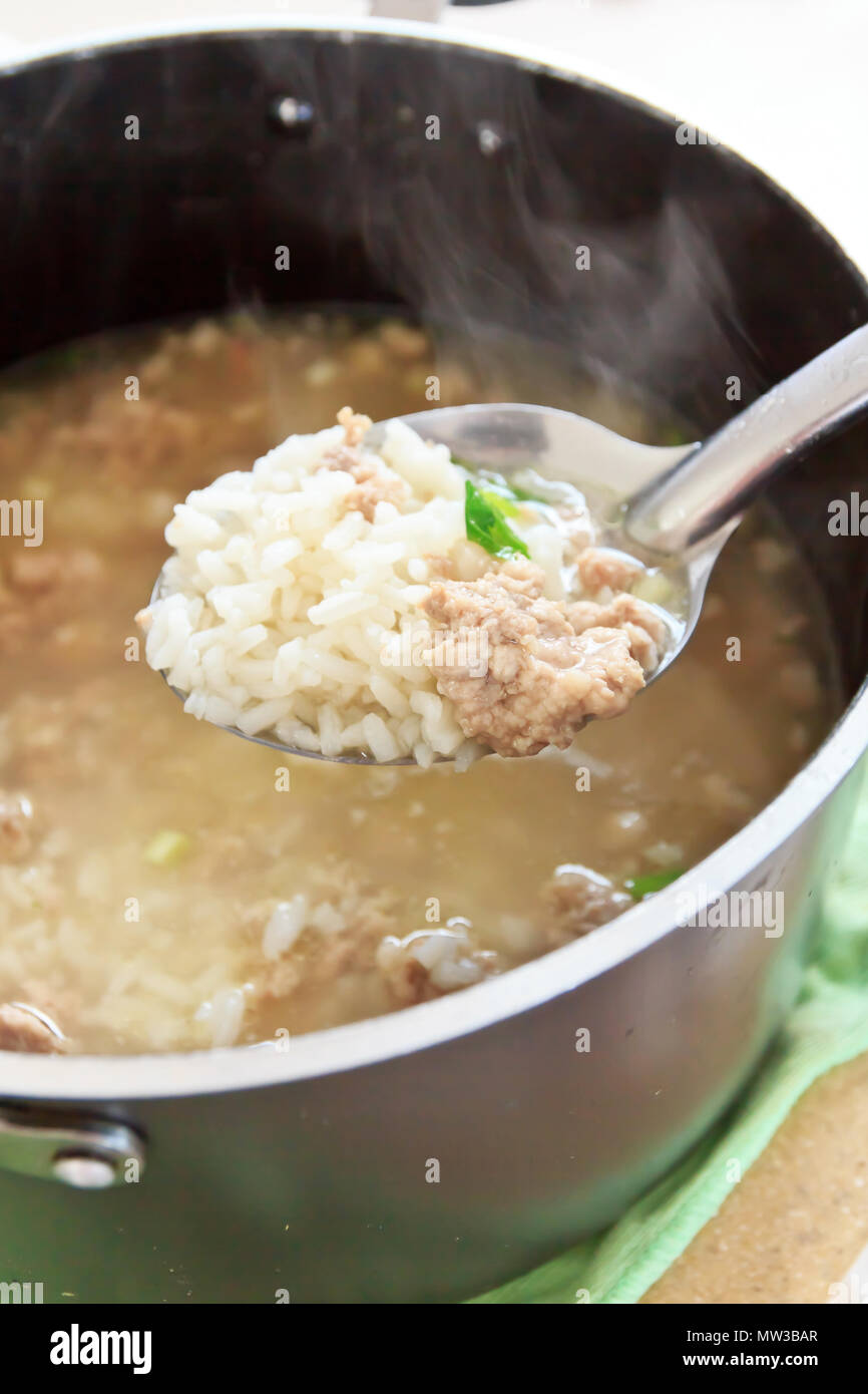 Hot porridge rice pig in pot Stock Photo - Alamy