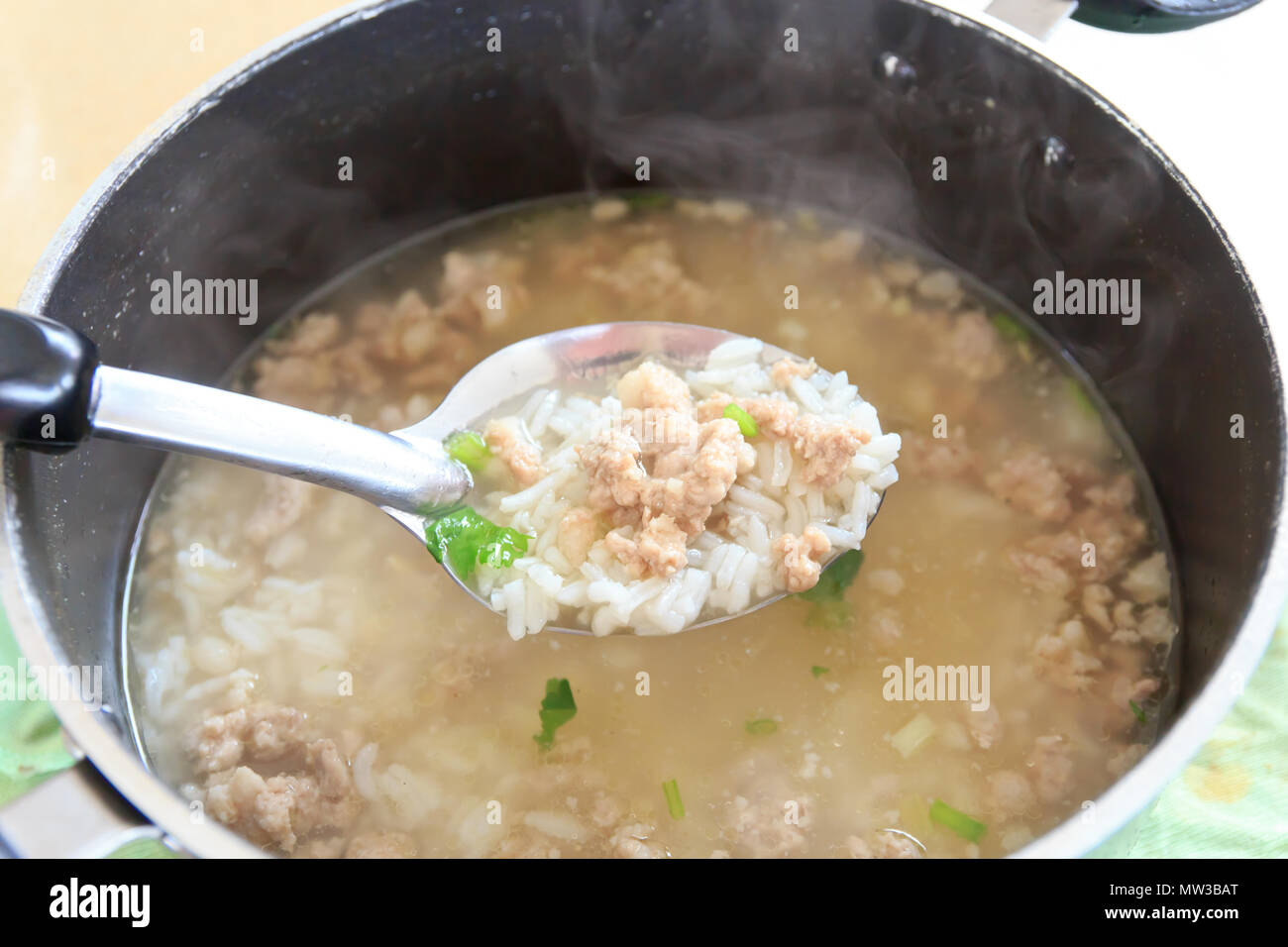 Hot porridge rice pig in pot Stock Photo - Alamy