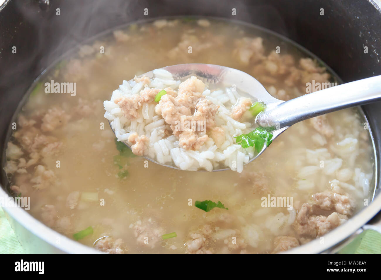 Ladle rice gruel hi-res stock photography and images - Alamy
