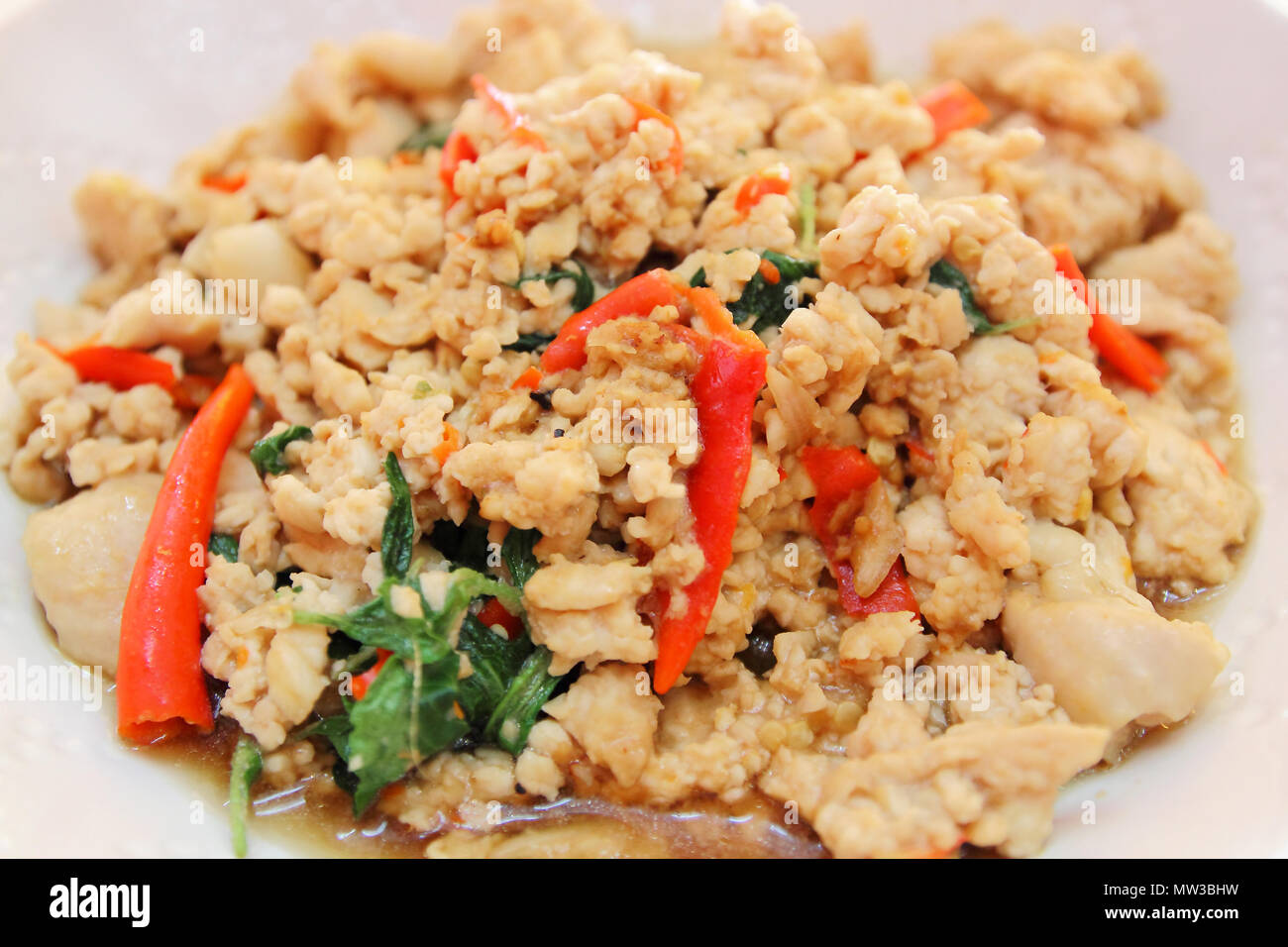 Thai food with chicken chilli basil Stock Photo - Alamy
