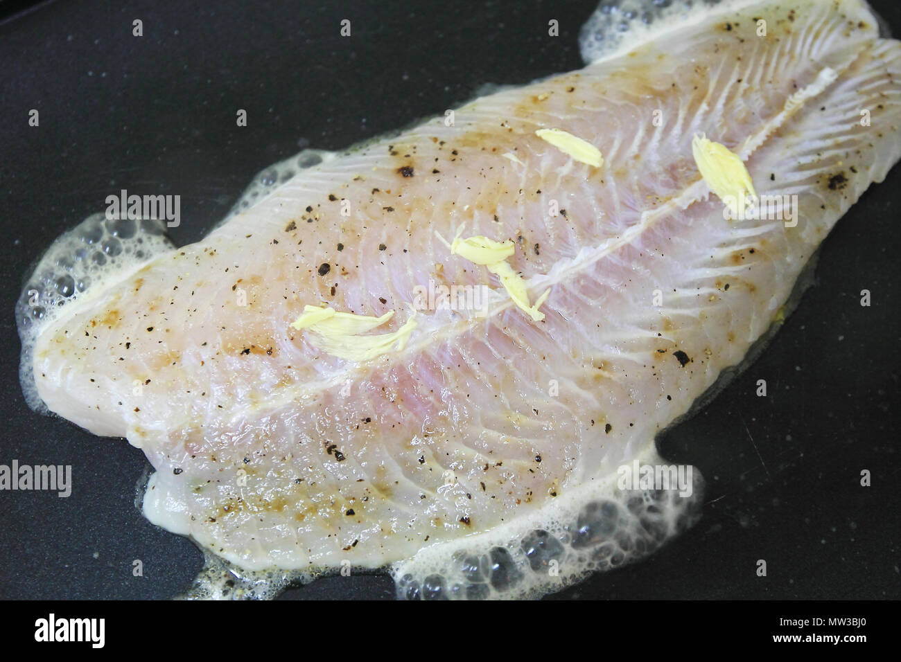 fillet of fish pangasius, steak cooking Stock Photo - Alamy