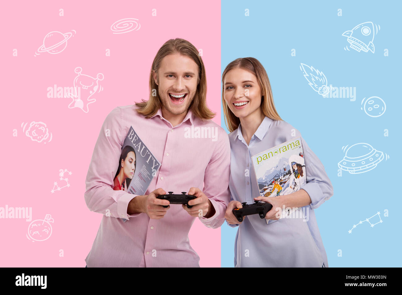 Happy couple smiling and playing video games together Stock Photo - Alamy