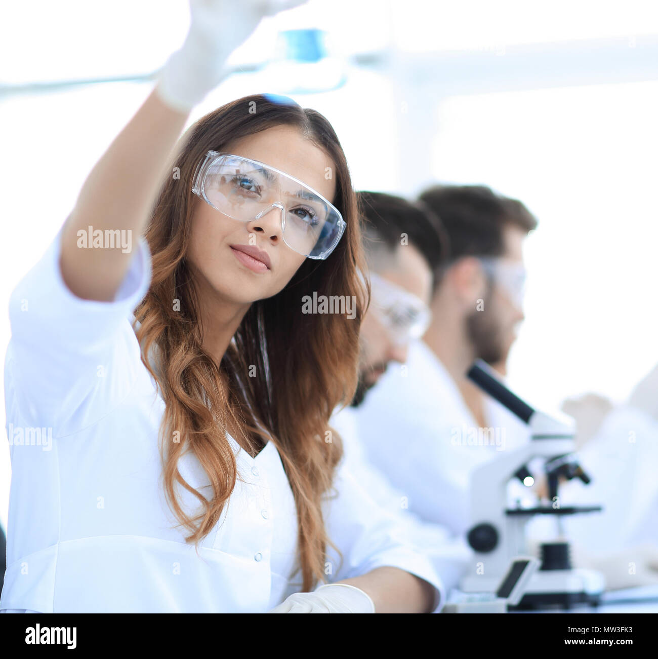 group of creative scientists working in a laboratory Stock Photo - Alamy