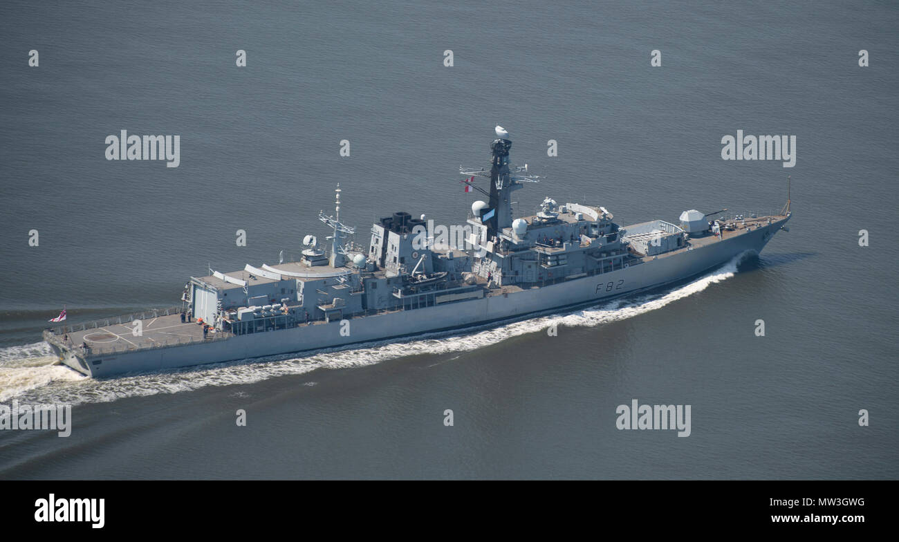 Aerial photo of Royal Navy Frigate on calm sea Stock Photo - Alamy