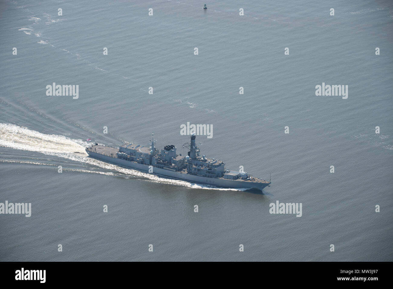 Aerial photo of Royal Navy Frigate on calm sea Stock Photo - Alamy