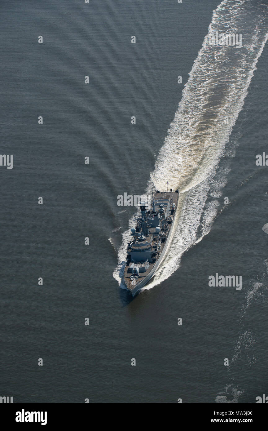 Aerial photo of Royal Navy Frigate on calm sea Stock Photo - Alamy