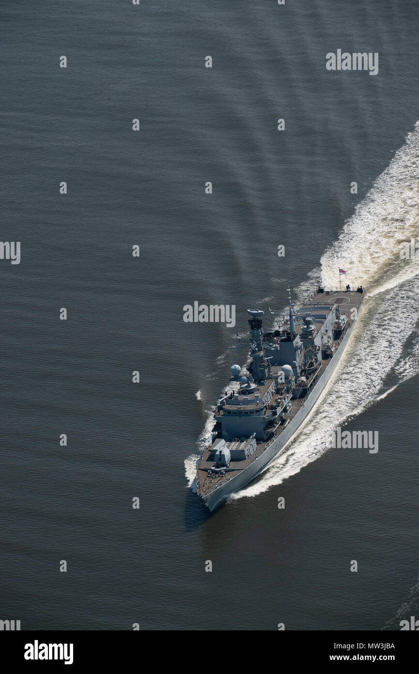Aerial photo of Royal Navy Frigate on calm sea Stock Photo - Alamy