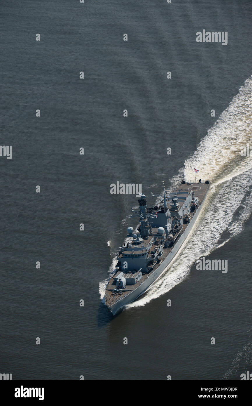 Aerial photo of Royal Navy Frigate on calm sea Stock Photo - Alamy