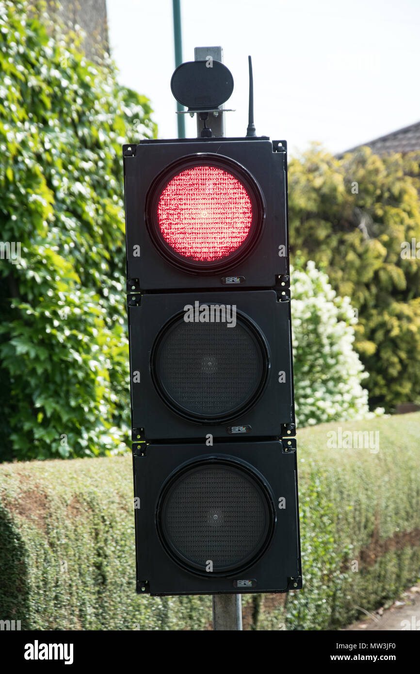 Temporary traffic light with red light showing Stock Photo - Alamy