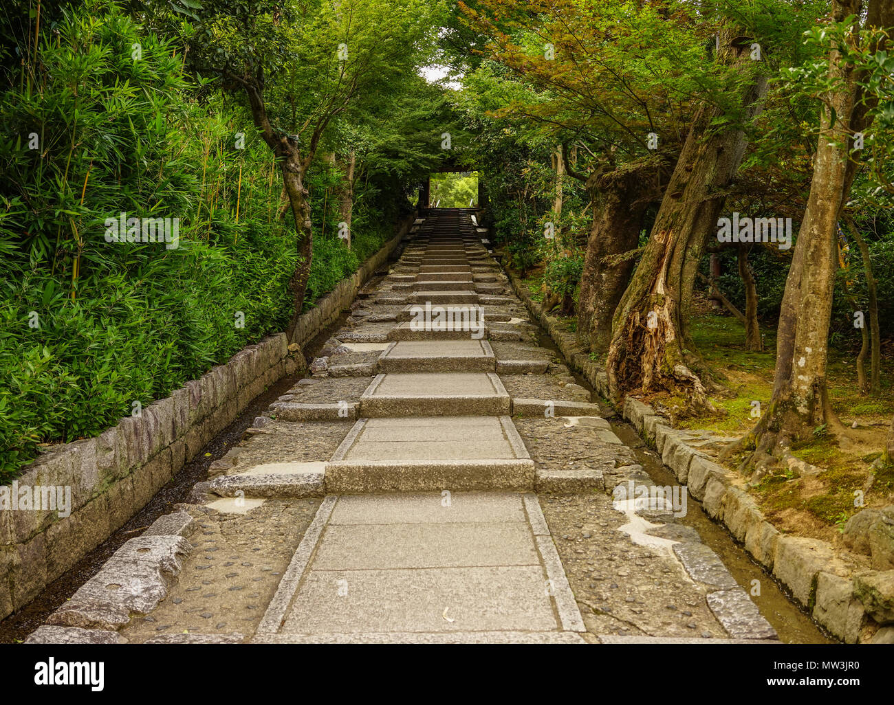 Stone path of ancient garden at old town in Kyoto, Japan Stock Photo ...